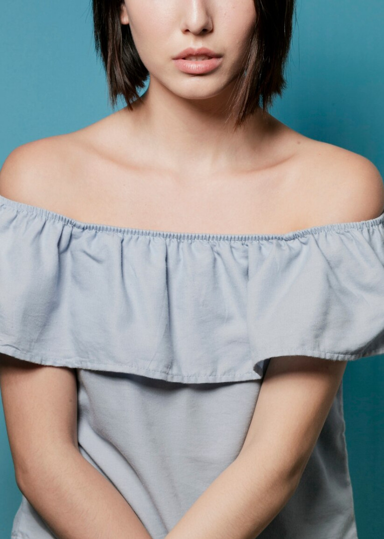 Elegance Unveiled: The Timeless Charms of the White Peplum Top - Blog KakaClo